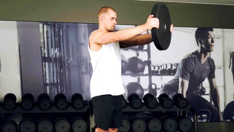Plate Front Raise: How To Do, Muscles Worked