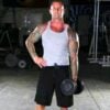 How To Do Dumbbell Shrugs for Stronger Shoulders