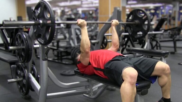 Smith Machine Bench Press: Muscles Worked, How To Do, Tips